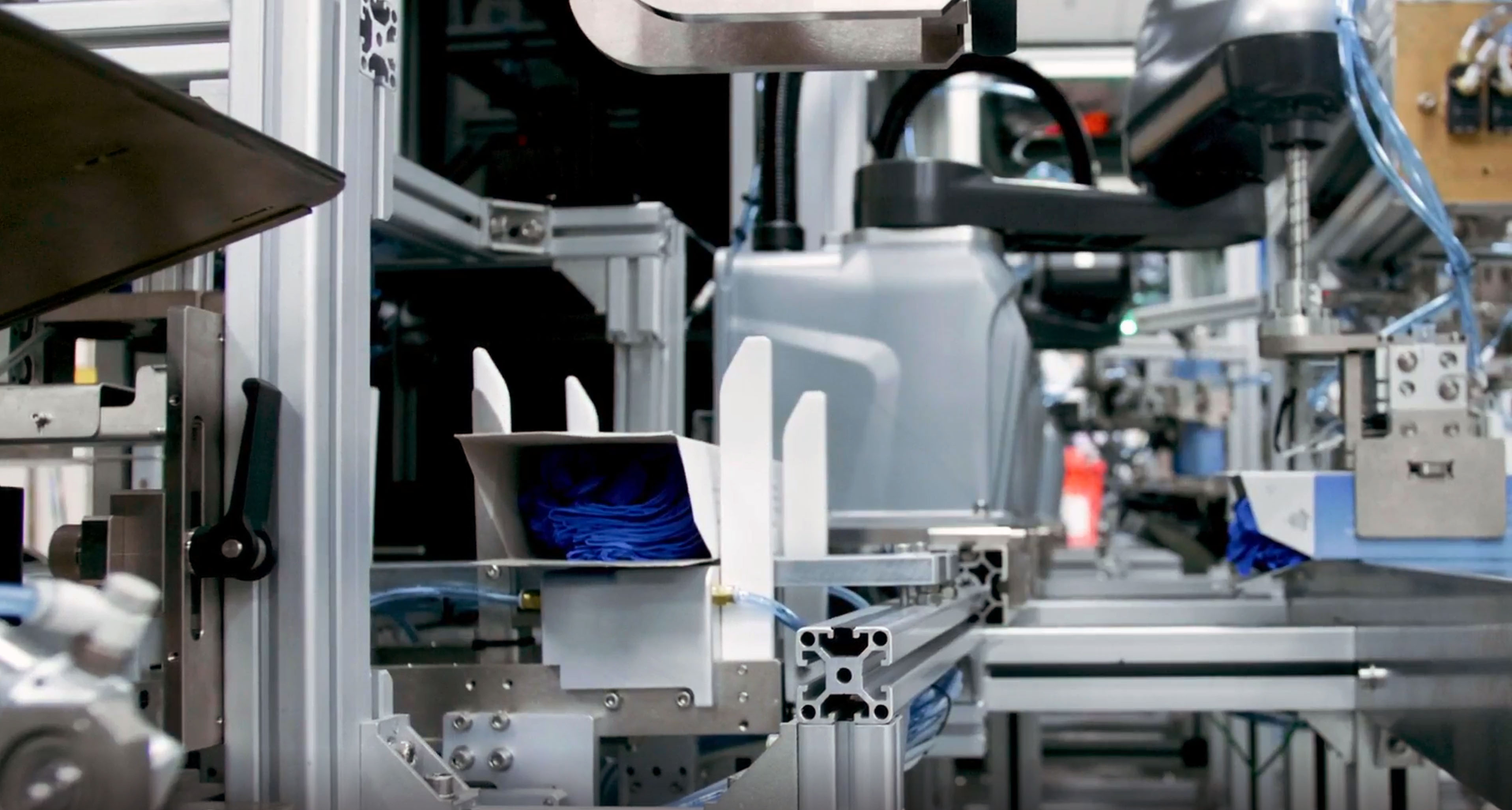 Glove Packaging Automation at AFA Group with OMRON Robotics